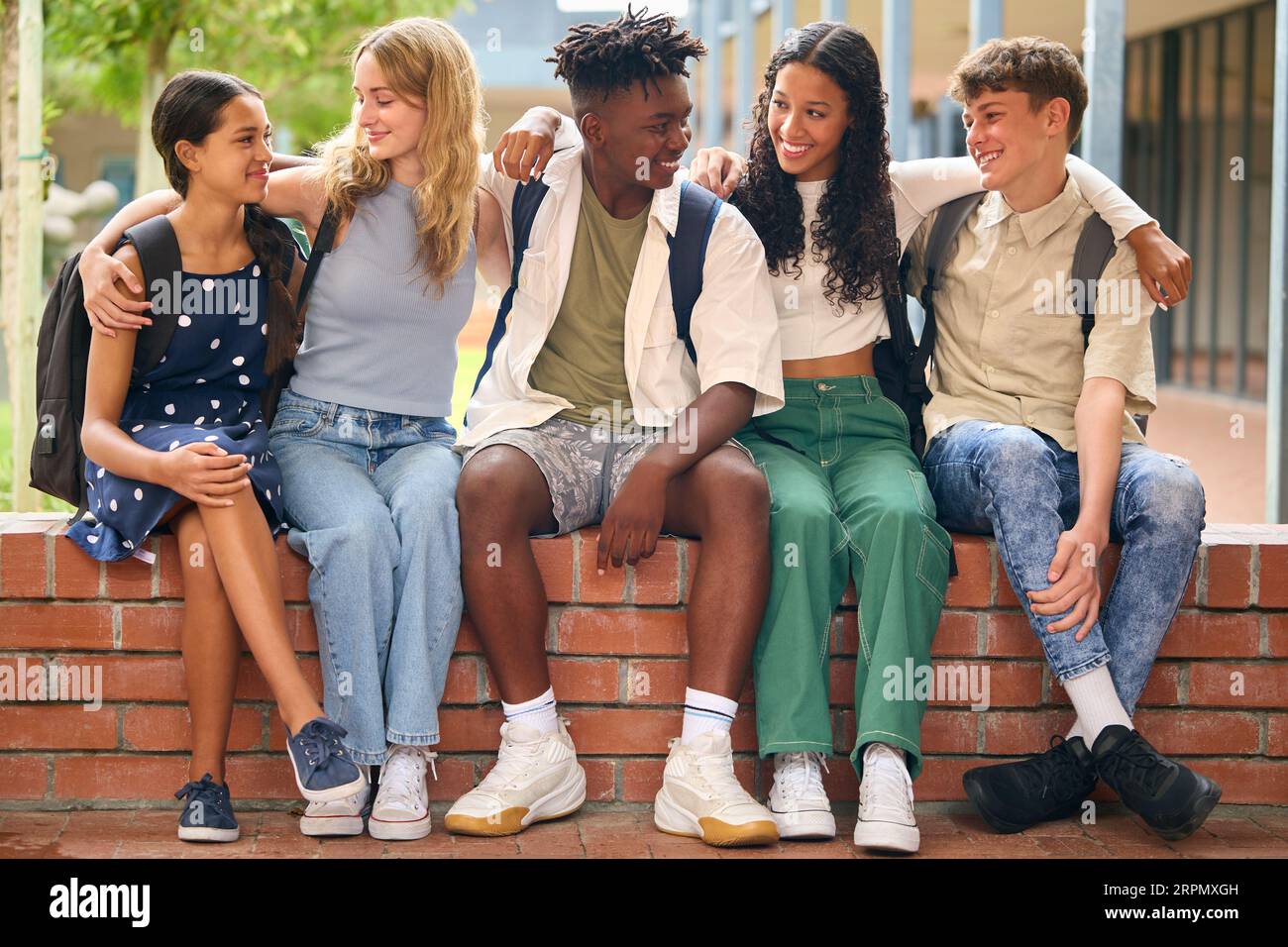 Portrait Of Multi-Cultural Secondary Or High School Students Sitting On ...