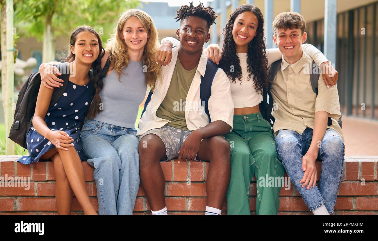 Portrait Of Multi-Cultural Secondary Or High School Students Sitting On ...