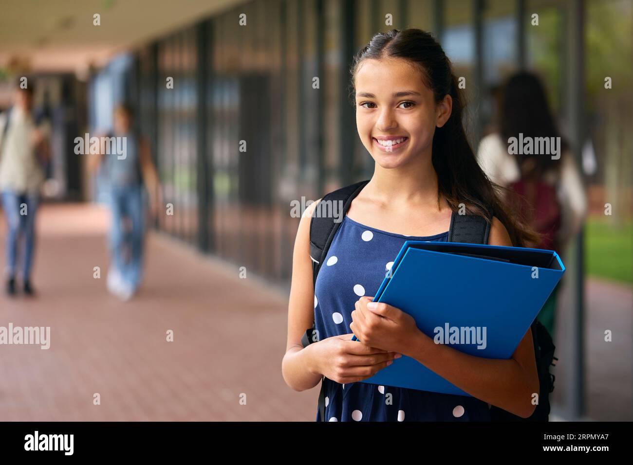 Portrait Of Female Secondary Or High School Student Outdoors At School ...