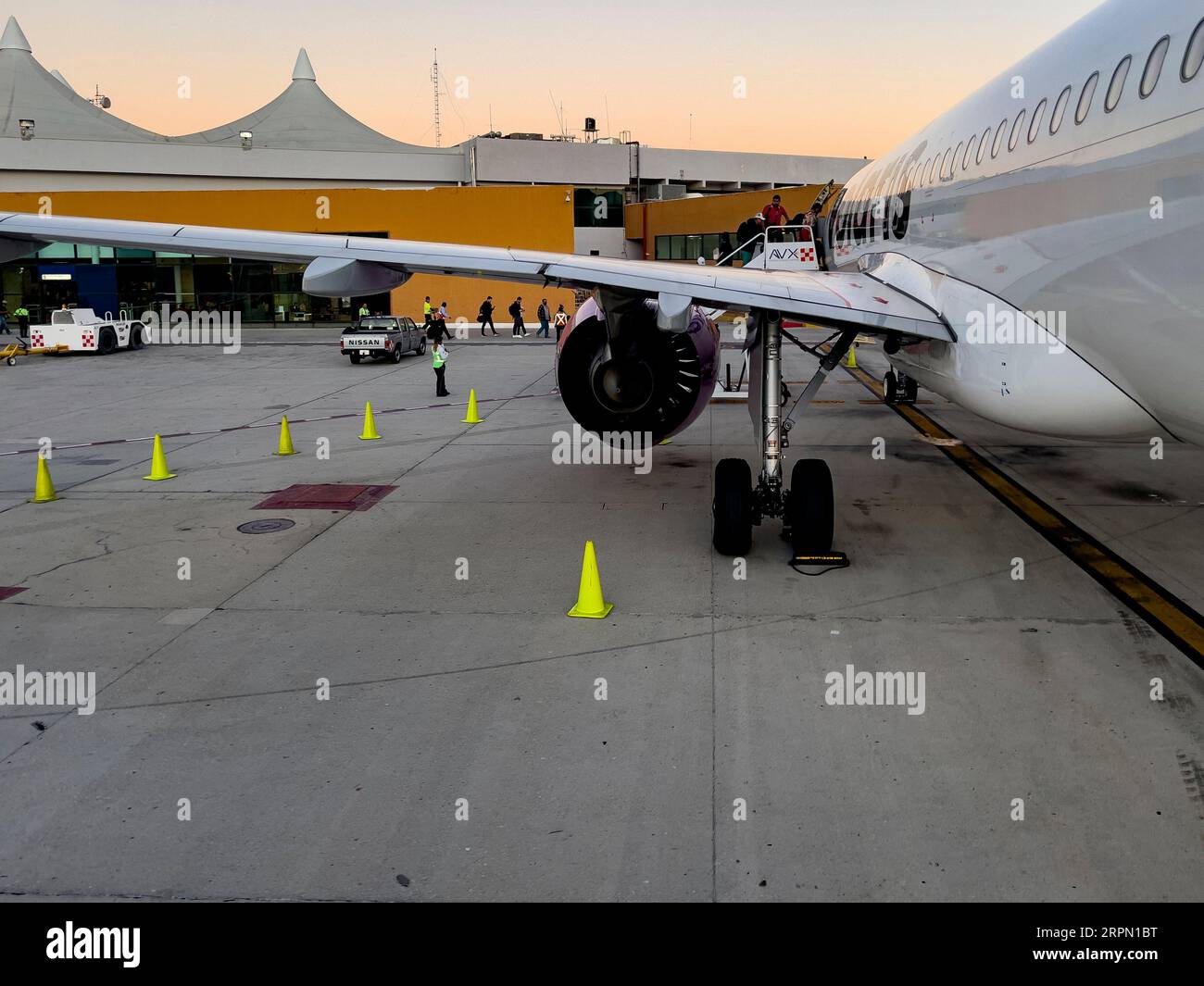Cabo San Lucas, Mexico, September 5, 2023: People boarding the Volaris ...