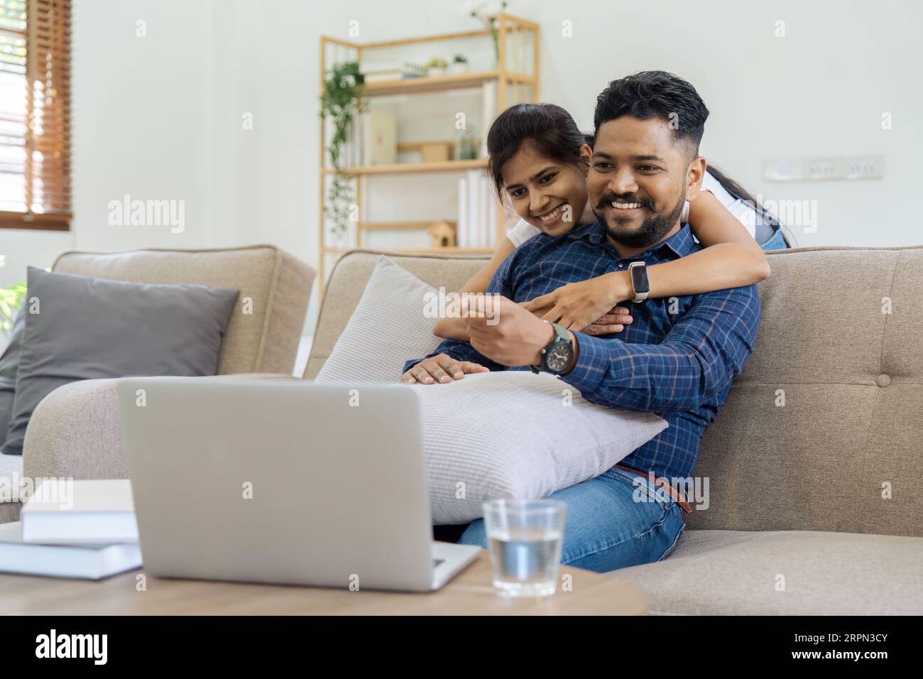 Together hugging husband indian hi-res stock photography and images - Alamy