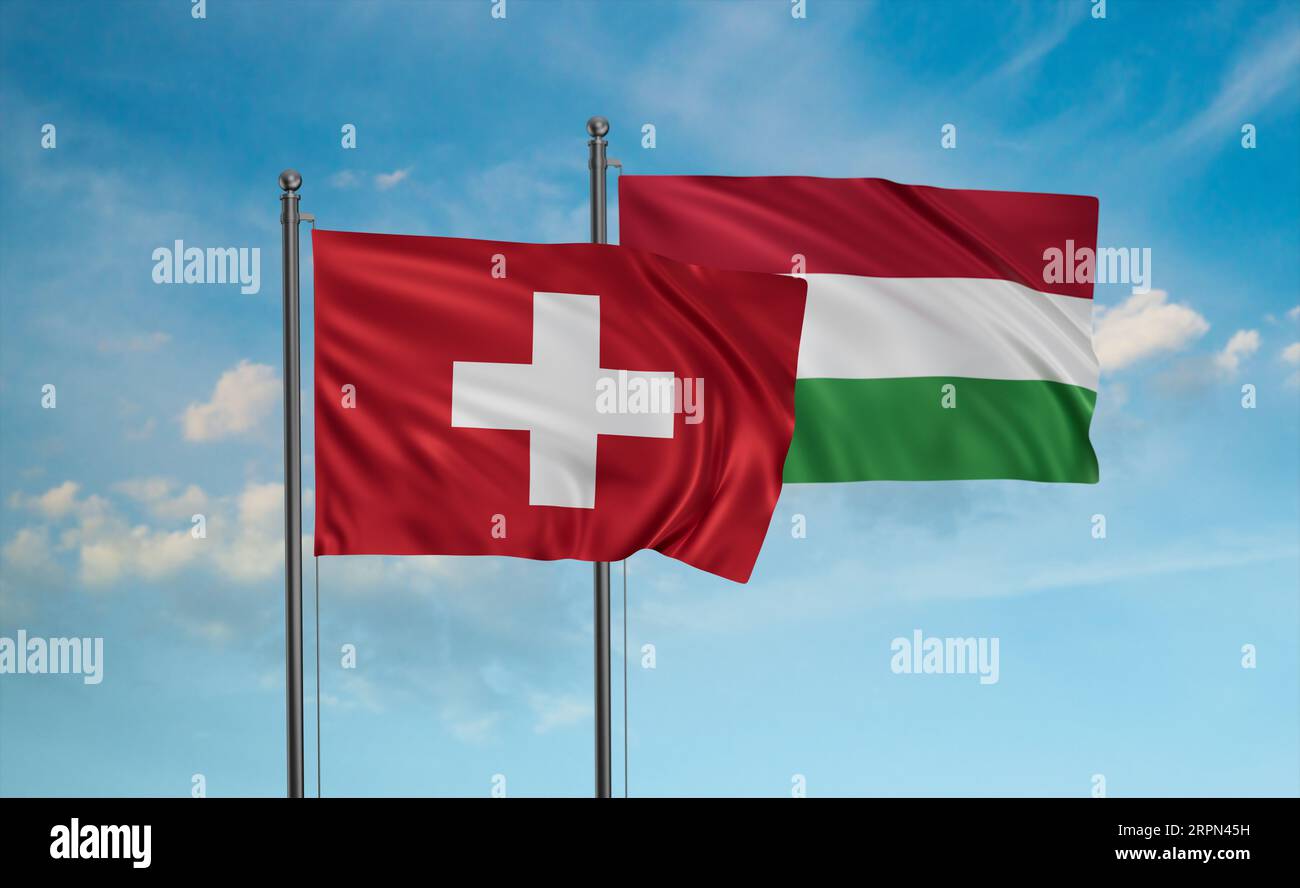 Hungary flag and Switzerland flag waving together on blue sky, two ...