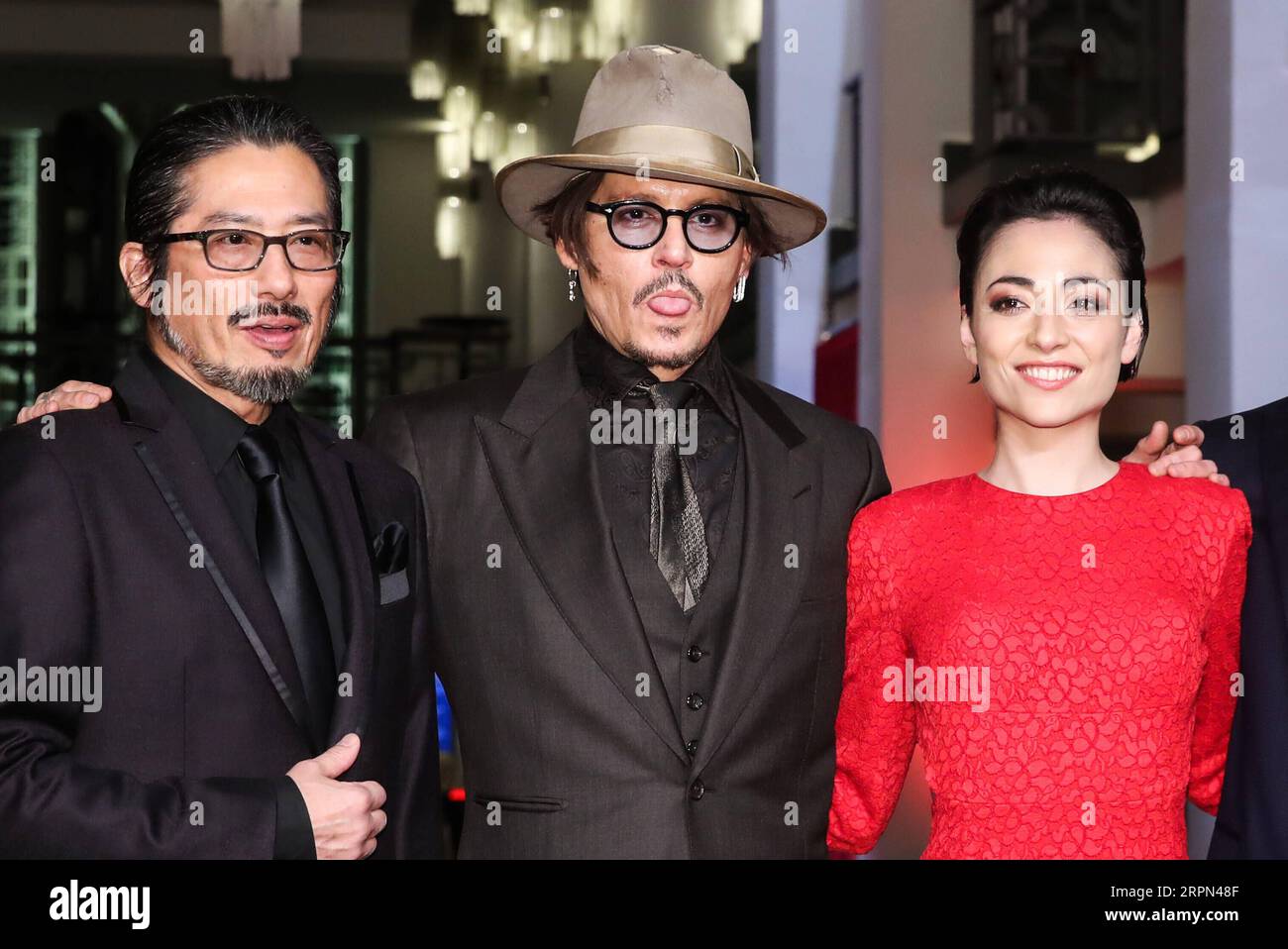 200222 -- BERLIN, Feb. 22, 2020 -- Actors Johnny Depp C, Hiroyuki ...