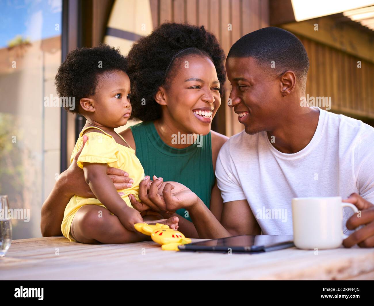 Black Parents Playing With Children