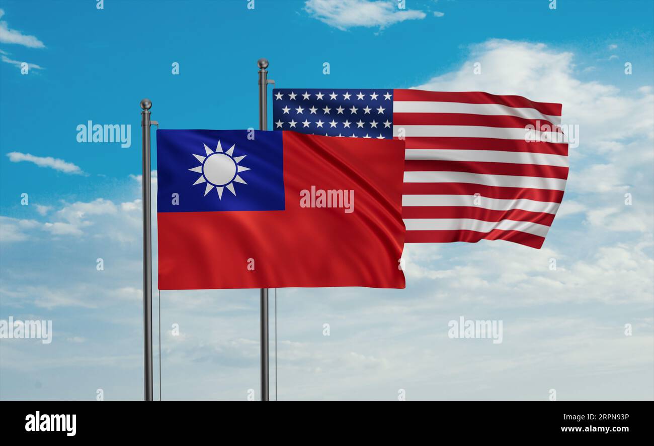 USA and Taiwan flag waving together in the wind on blue sky, two ...