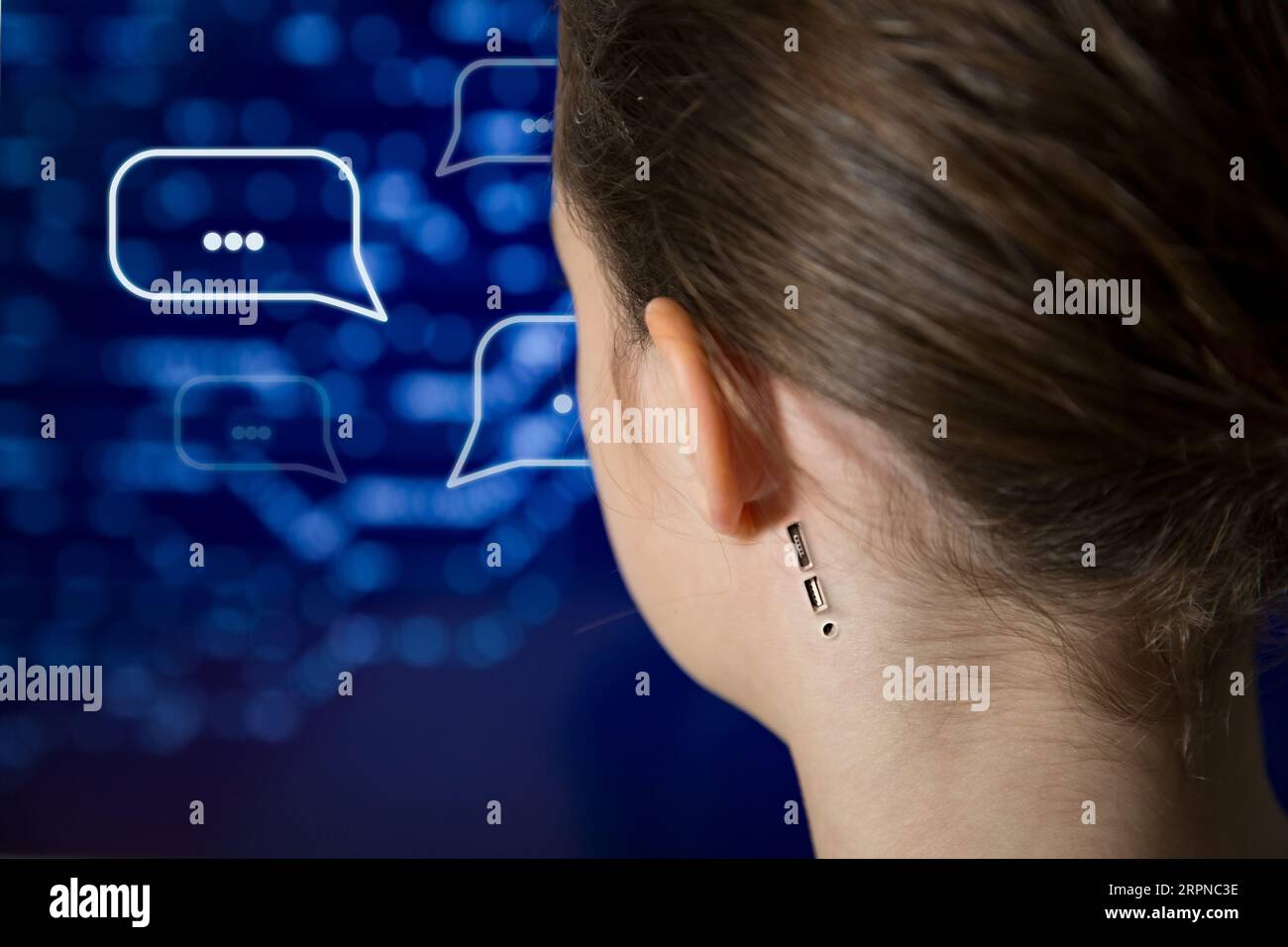 Different slots for memory cards and charging in the head of a teenage ...