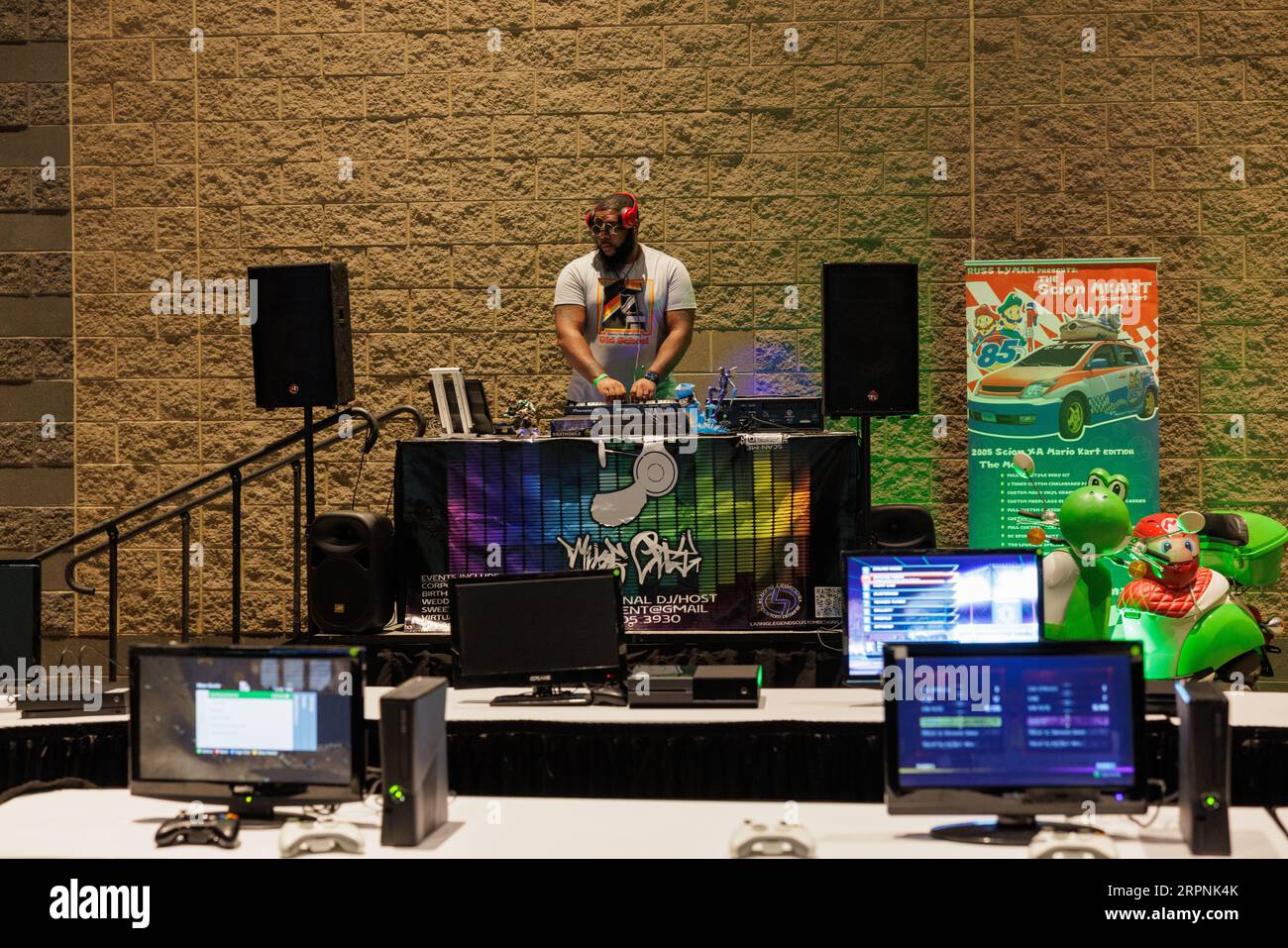A DJ plays music at the Retro Game Expo at the Connecticut Convention ...