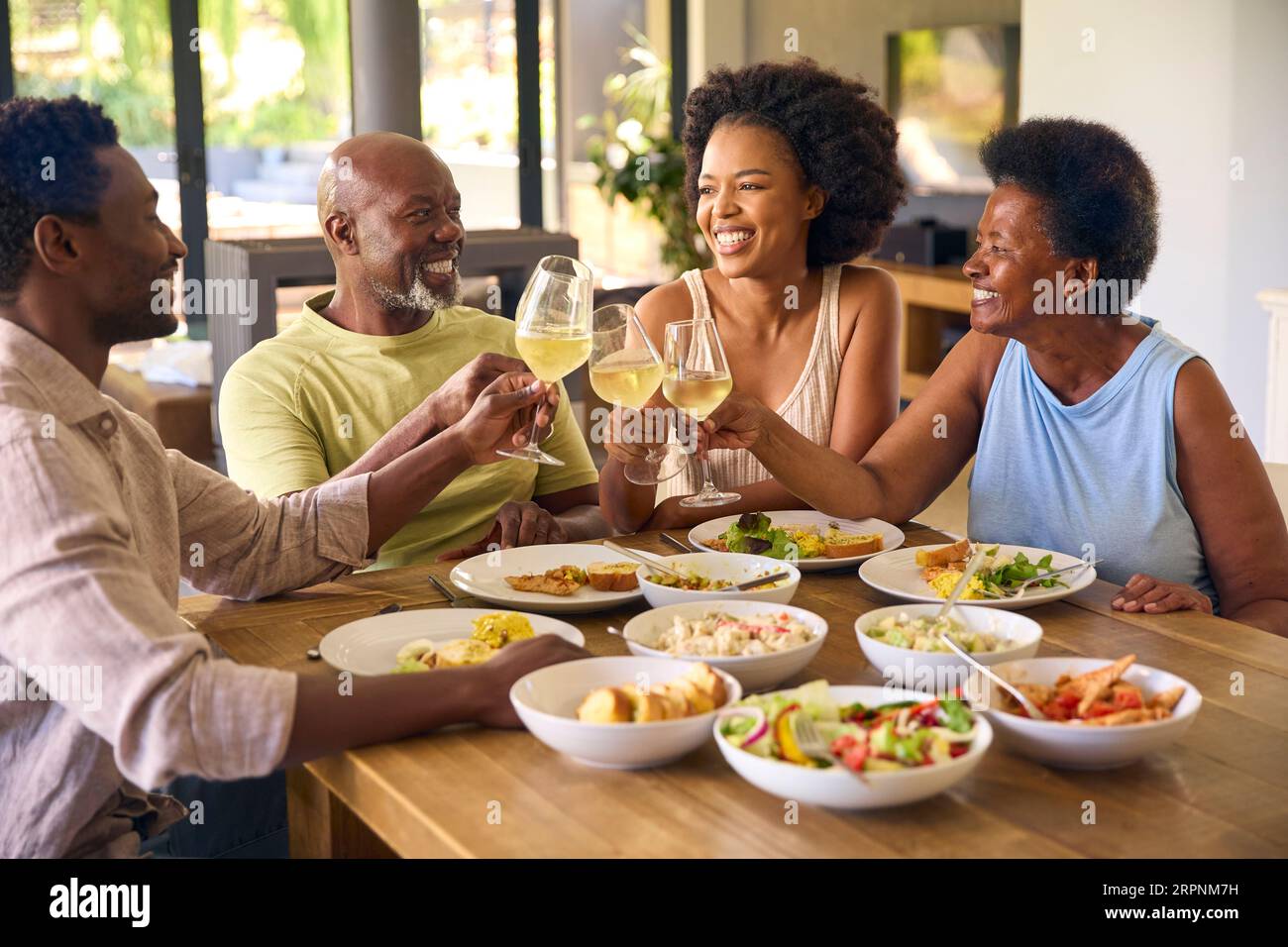 Father son cheers hi-res stock photography and images - Alamy