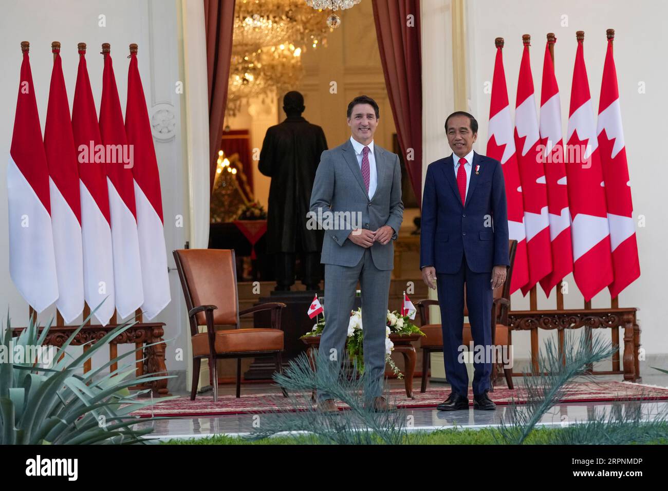 Canadian Prime Minister Justin Trudeau, left, poses for a photo with ...