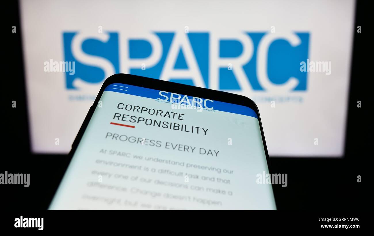 Smartphone with website of US retail company SPARC Group LLC on screen ...