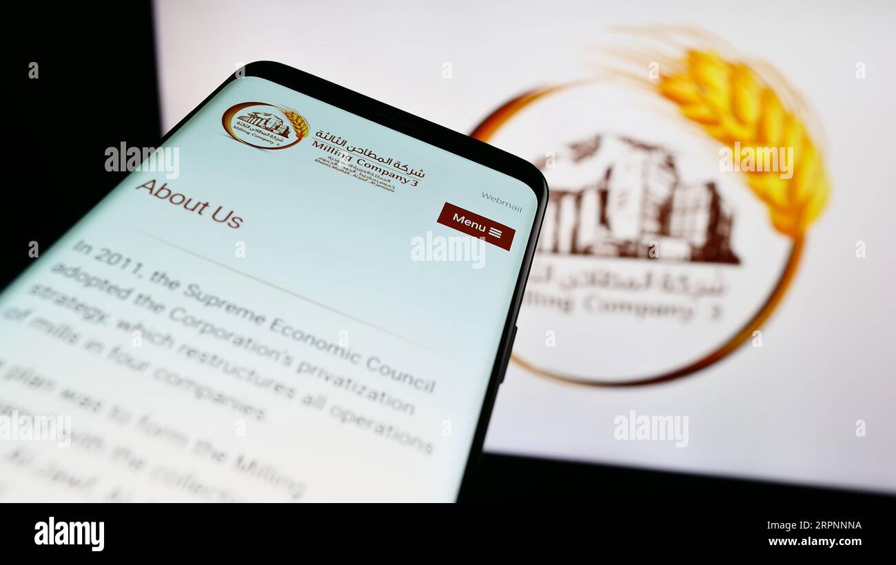 Mobile phone with website of Saudi Arabian business Milling Company 3 ...
