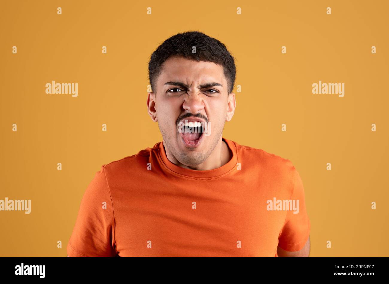 Human reactions concept. Angry brazilian man shouting, screaming loud ...