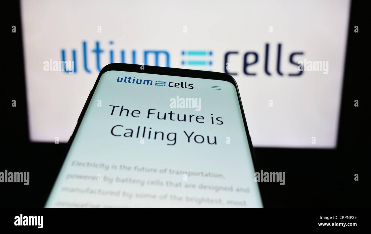 Mobile phone with webpage of US EV battery company Ultium Cells LLC on ...