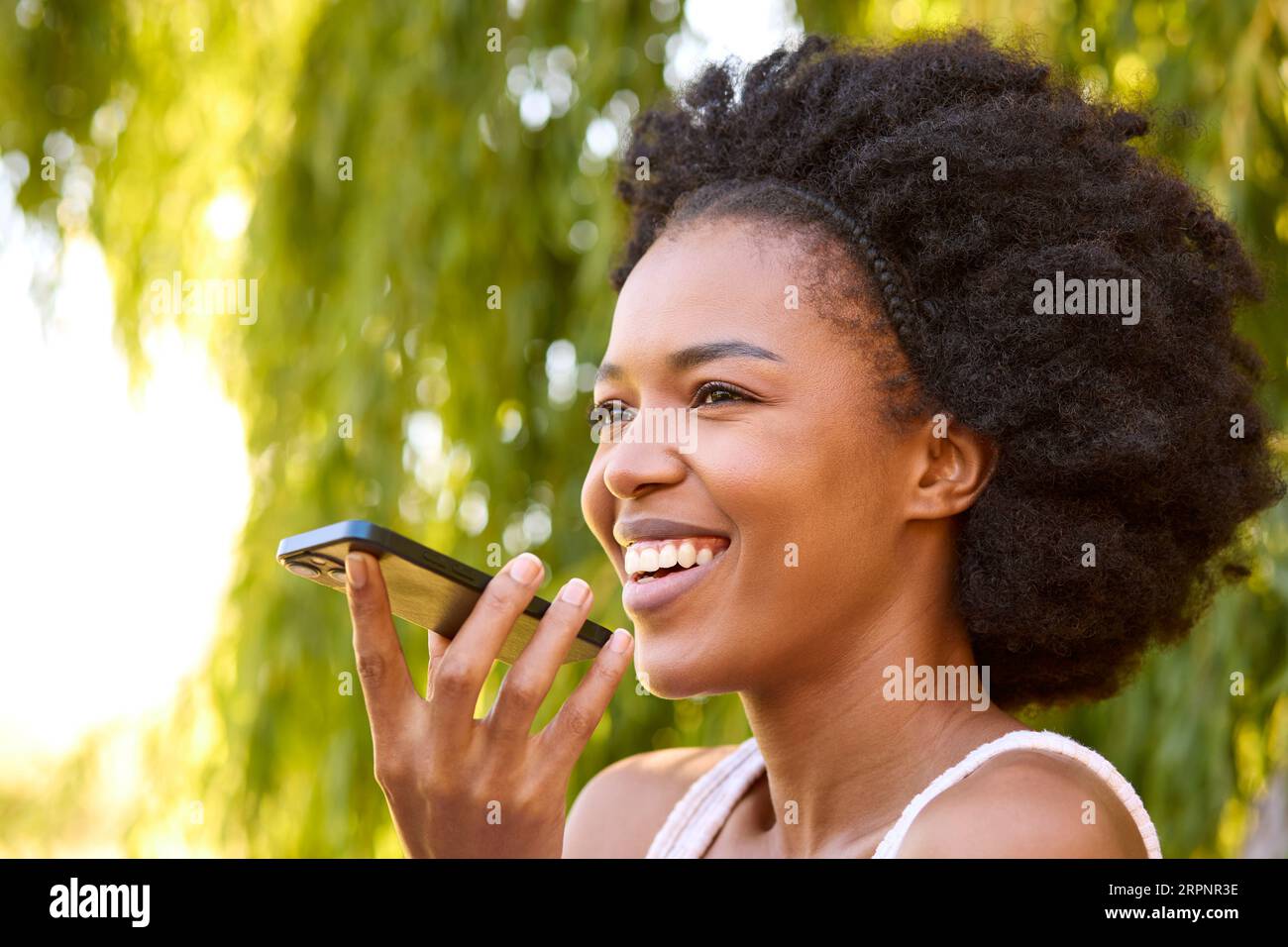 Talking into microphone hi-res stock photography and images - Alamy
