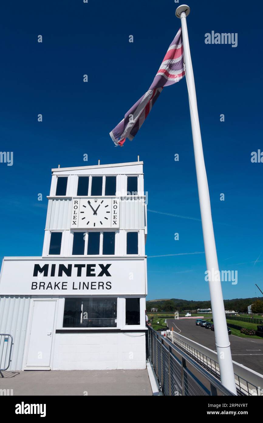 Timing and commentary tower above the pits with Union Jack flag flying ...