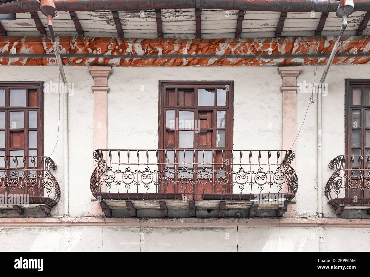 Street view of the facade of an old colonial building, Cuenca, Ecuador ...