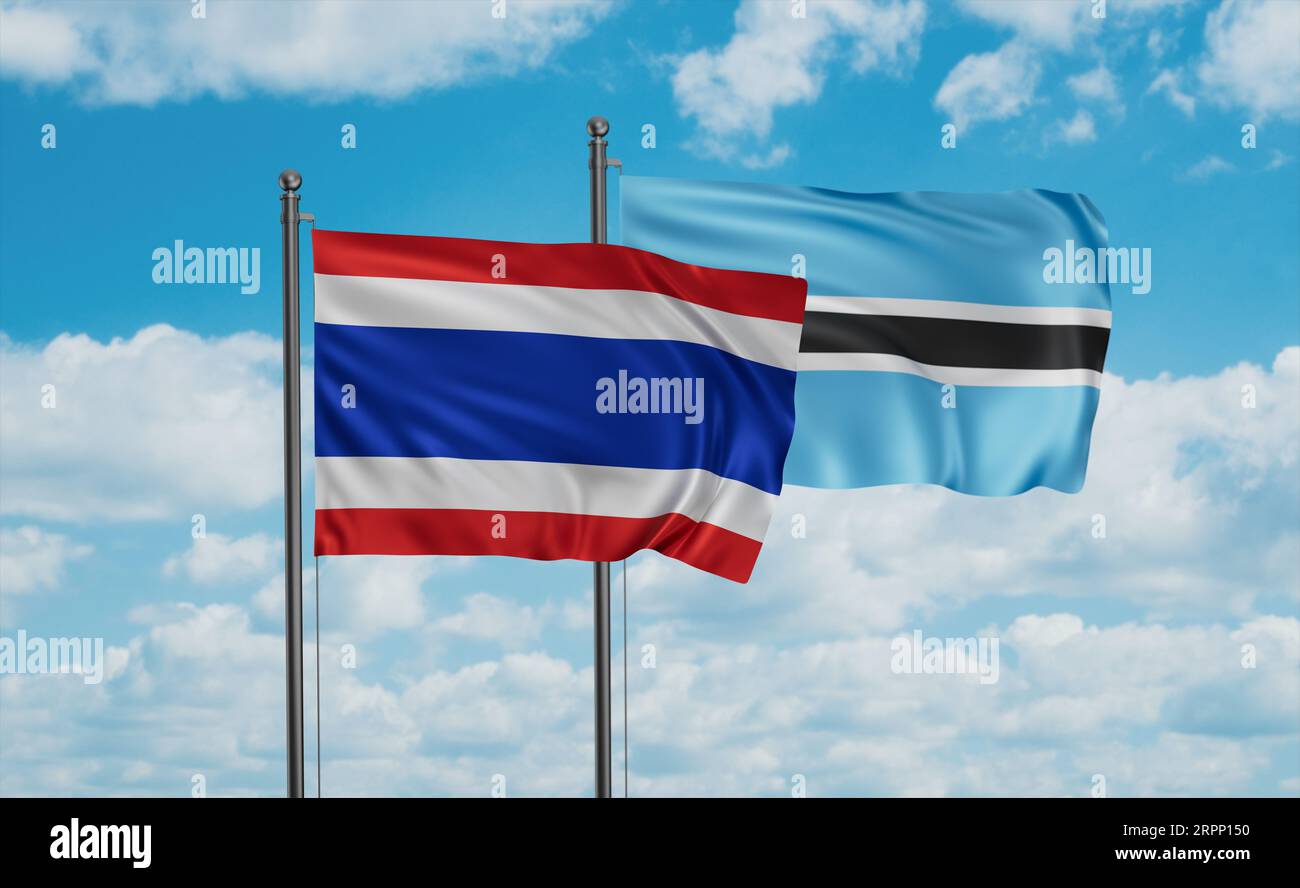 Botswana flag and Thailand flag waving together on blue sky, two ...