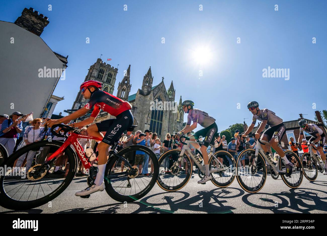 The peloton passes Howden Minster during stage three of the 2023 Tour ...