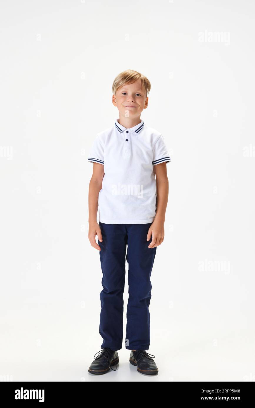 Full-length portrait of boy, child wearing smart casual clothes for ...