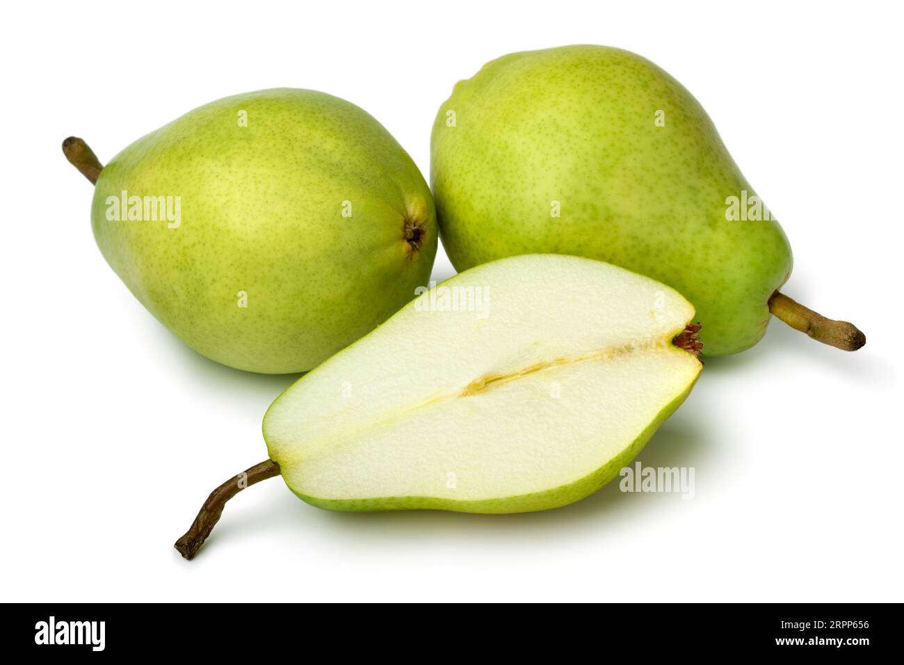 Whole and half fresh sweet sugar pears close up isolated on white ...