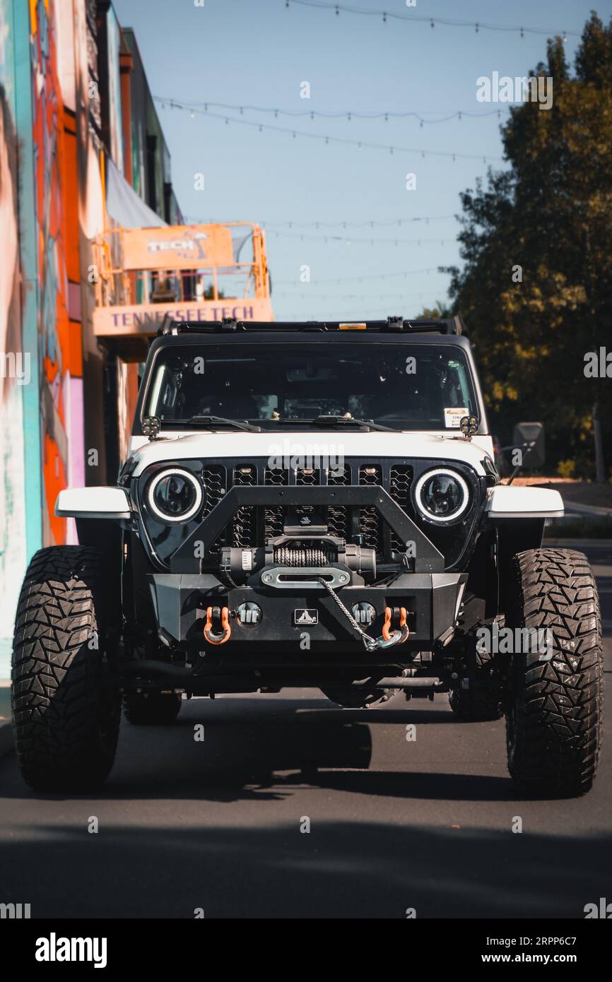 Front of Jeep with street background Stock Photo - Alamy