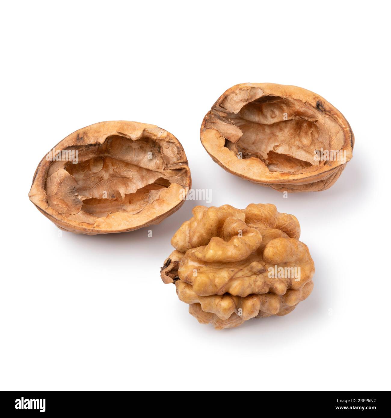 Single peeled walnut and shell isolated on white background close up ...