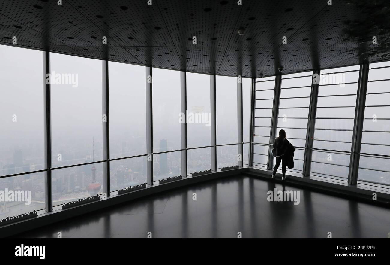 200312 -- SHANGHAI, March 12, 2020 -- A tourist enjoys views from the ...