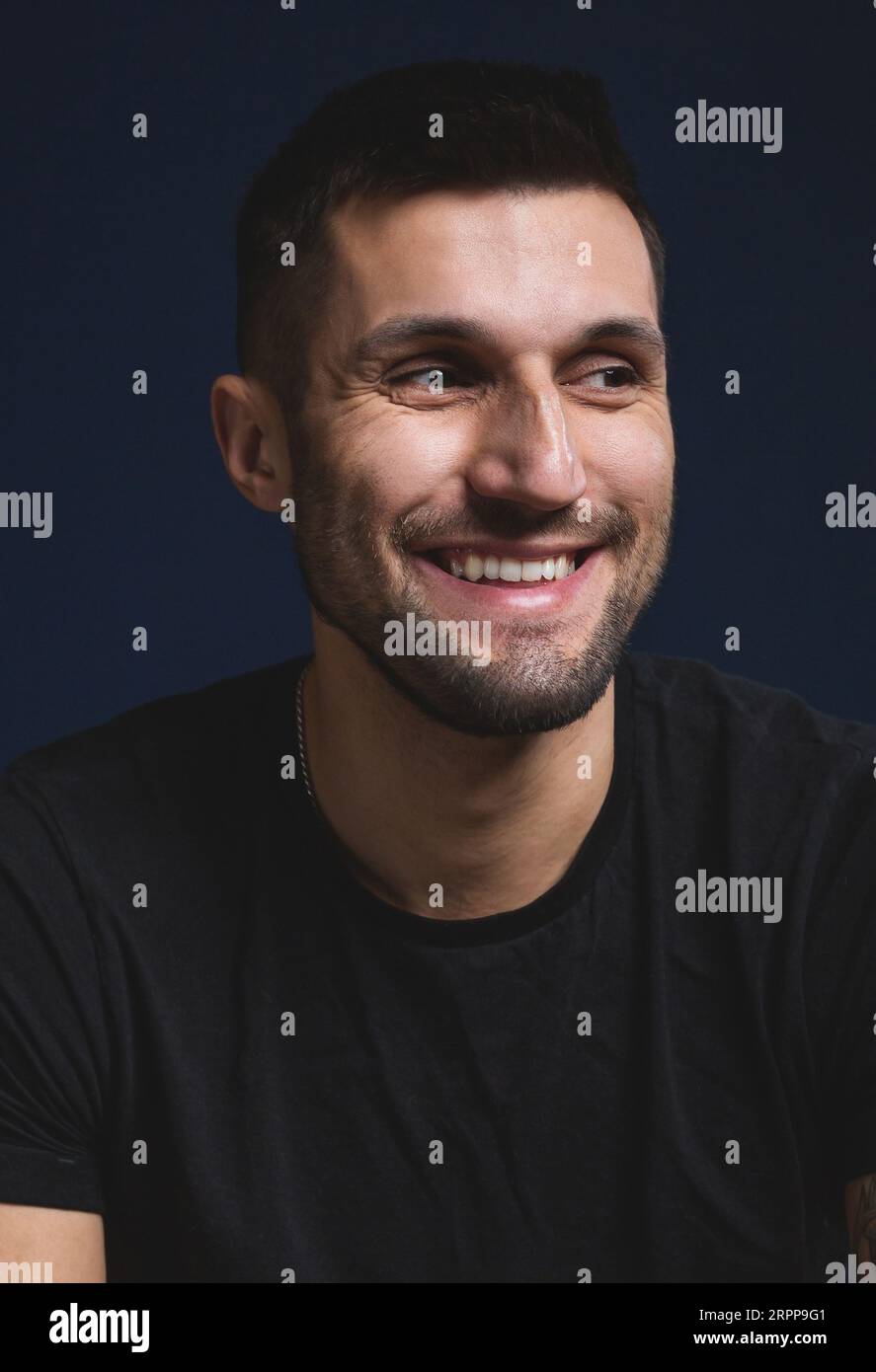 Happy successful young man hi-res stock photography and images - Alamy