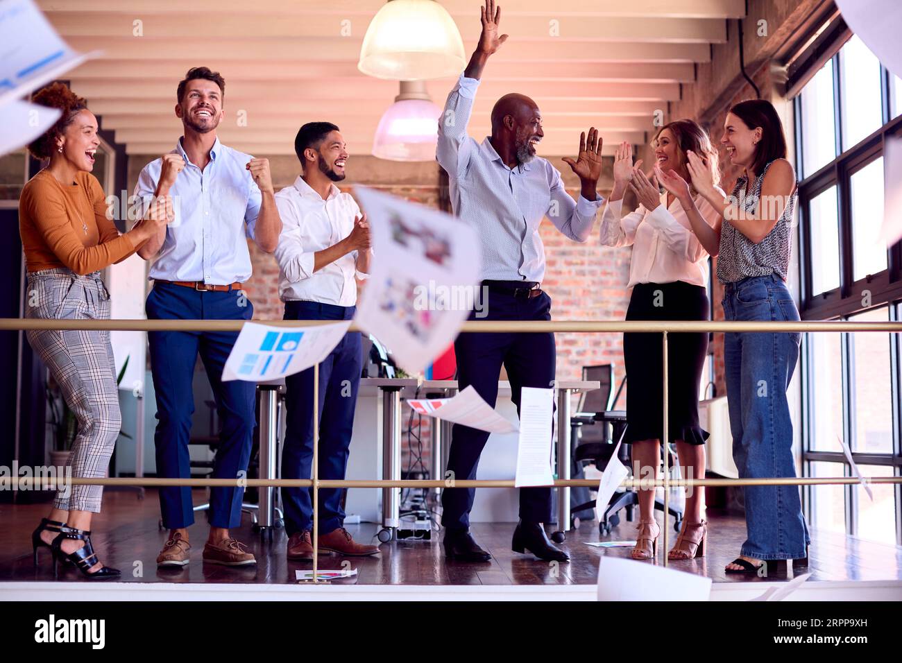 Relaxed Business Team Meeting In Multi-Cultural Office With Colleagues ...