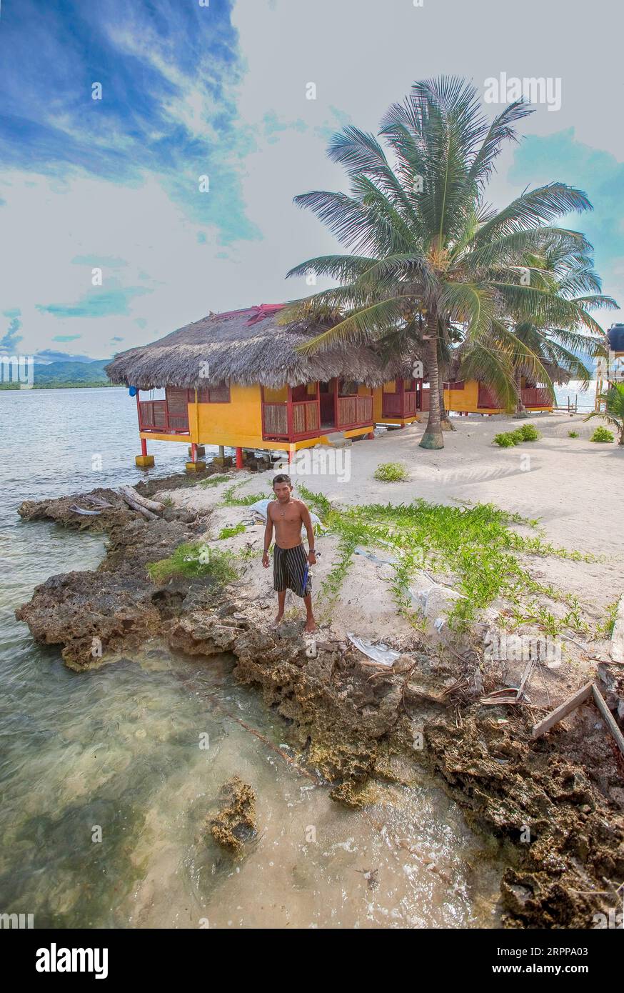 Panama, San Blas Archipel, Kuna indian on Kainora island shows the ...