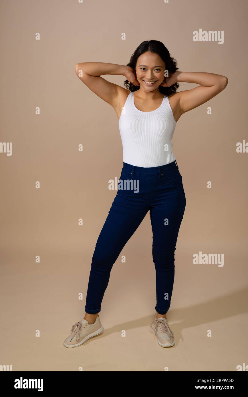Lady dark hair standing face hi-res stock photography and images - Alamy