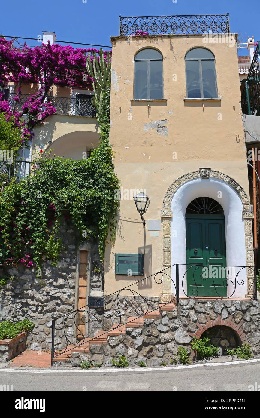 Arch door at small yellow house in positano italy hi-res stock ...