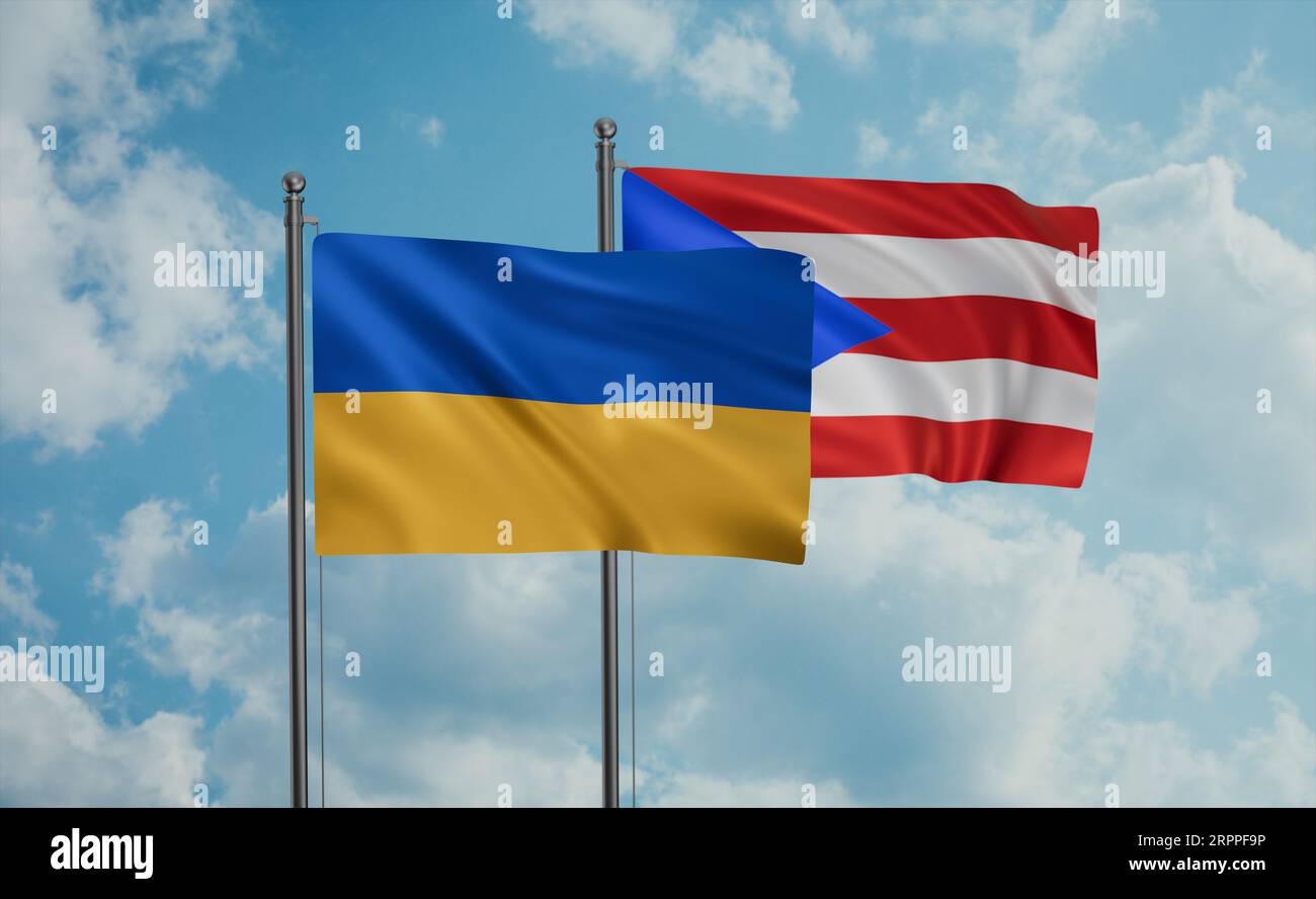 Puerto Rico and Ukraine flag waving together in the wind on blue sky ...