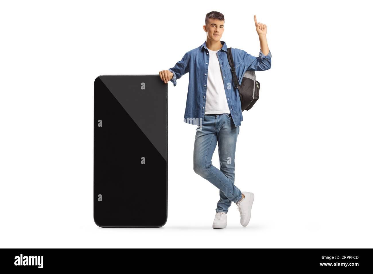 Teenage student pointing up hi-res stock photography and images - Alamy