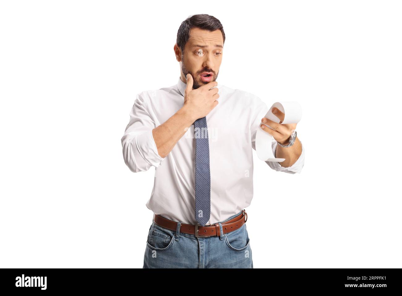 Shocked young man looking at a bill isolated on white background Stock ...