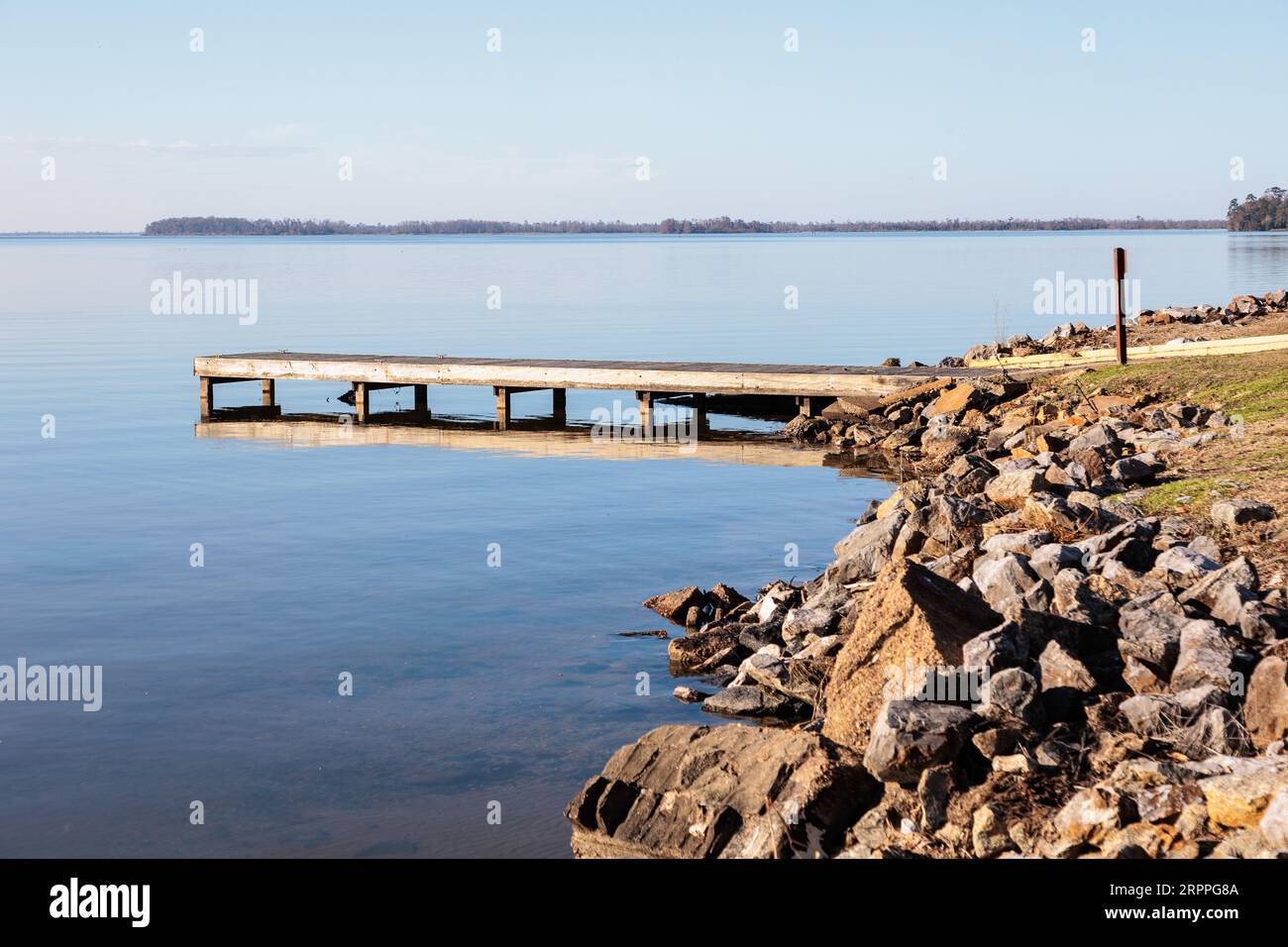 Small wooden dock and boat ramp on Lake Seminole at the Corps of ... Small wooden dock and boat ramp on Lake Seminole at the Corps of ...