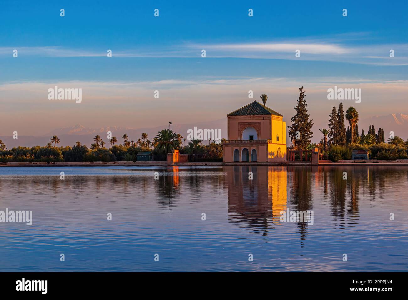 Saadian Pavillon at Menara gardens with Atlas mountains in Marrakech ...