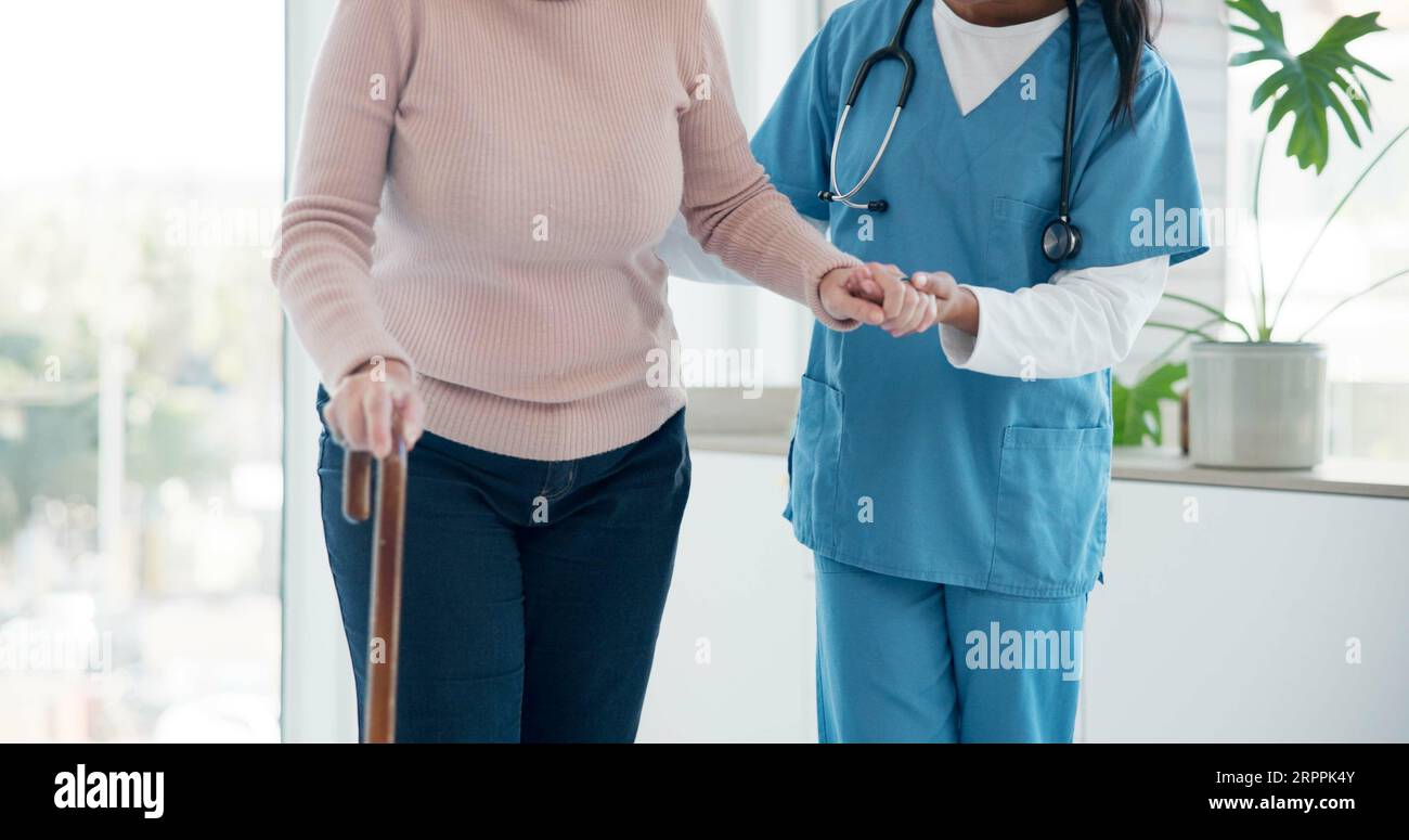 Caregiver hands, disabled and old woman with walking stick for support ...