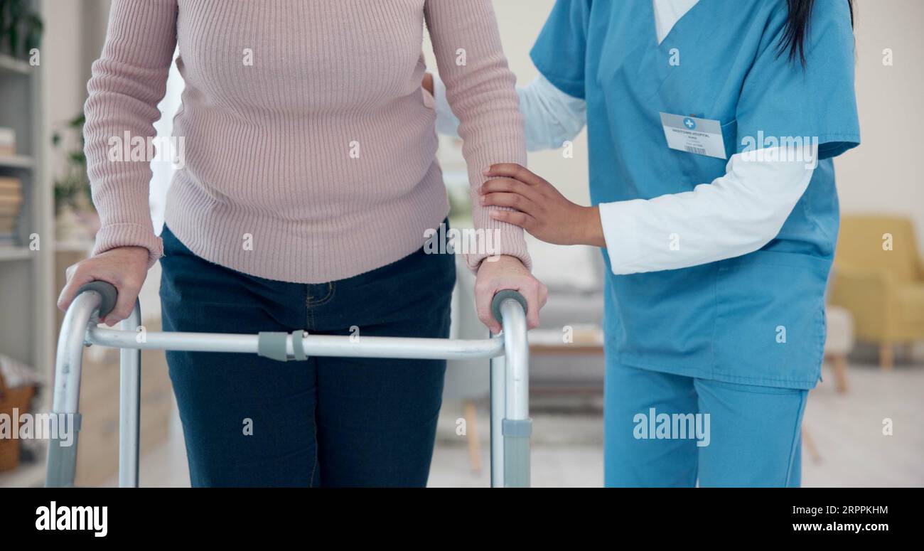 Nurse, hands or senior woman walking with walker for support, elderly care or old age movement ...