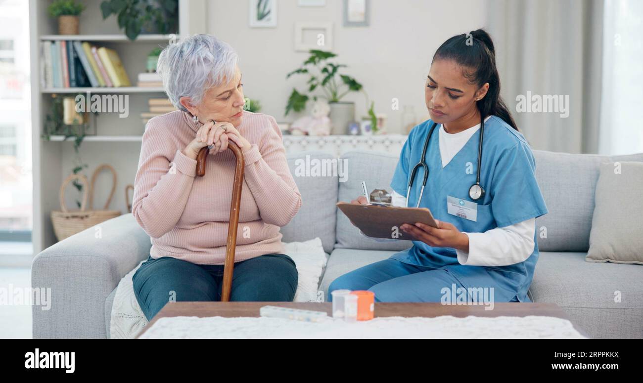 Clipboard, senior woman and nurse talking, ask question or writing ...