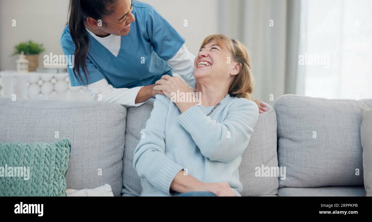 Caregiver, conversation and elderly woman laughing at funny joke ...