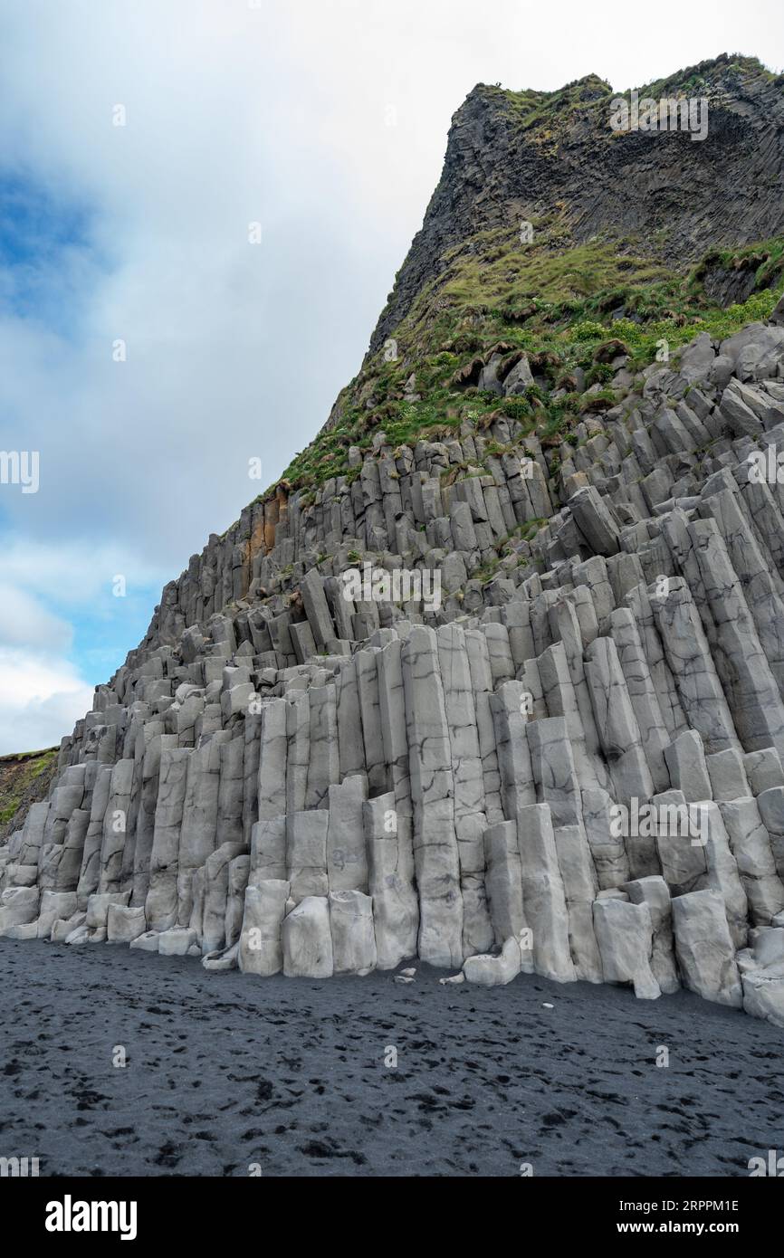 Interesting basalt rock volcanic formations along the black sand beach ...