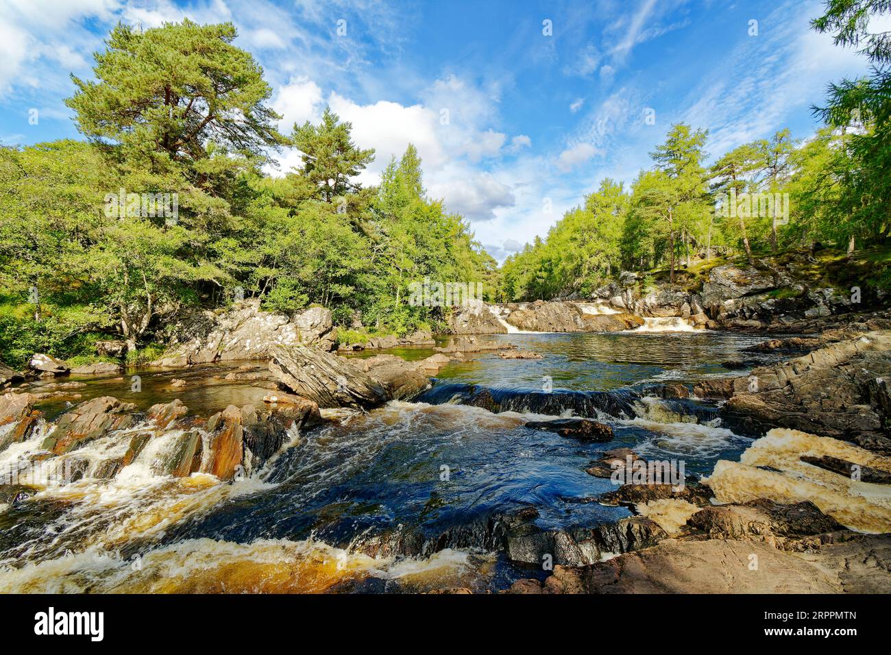 Rosehall Sutherland Scotland River Cassley a blue sky and the extensive ...