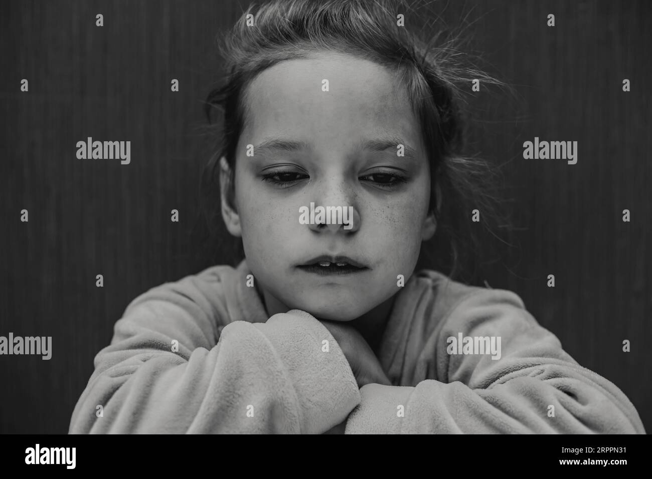 Dramatic photo of a crying kid Stock Photo - Alamy