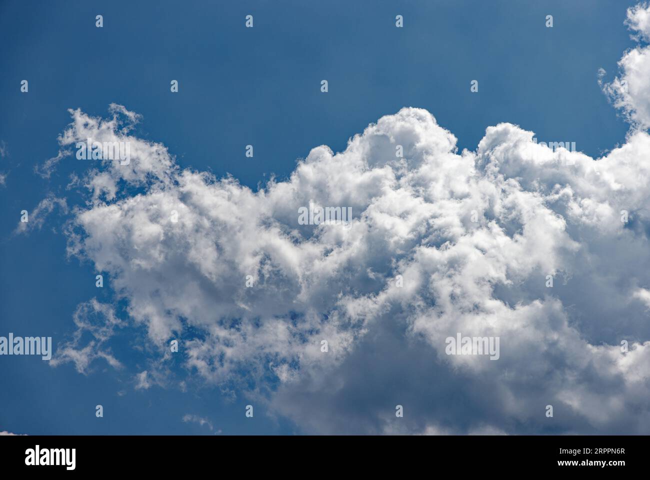 Billowing white clouds gliding over hi-res stock photography and images - Alamy