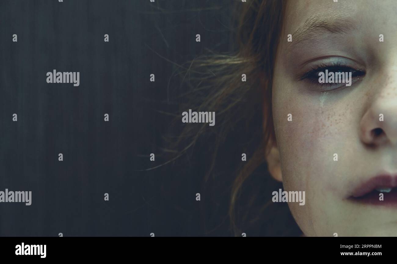 Dramatic photo of a crying kid Stock Photo - Alamy