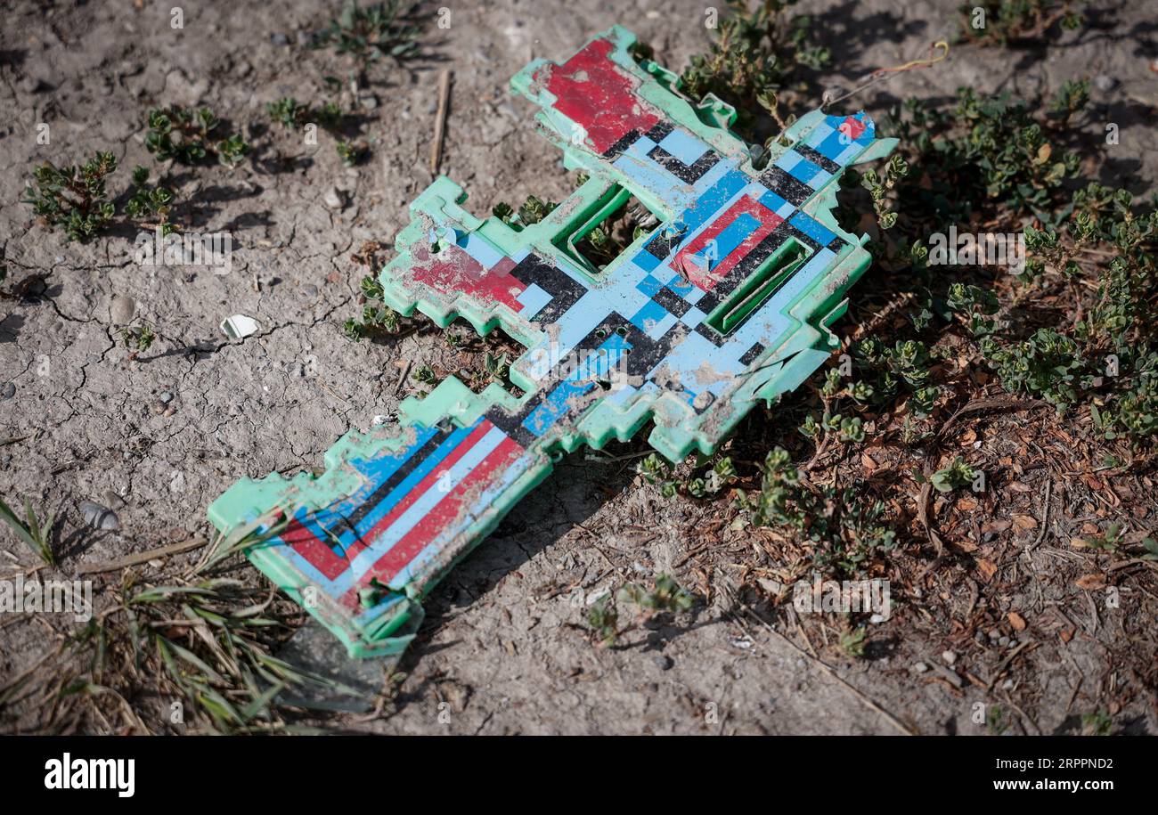 Stand Off, Canada. 25th Aug, 2023. A broken toy gun lies on the ground ...