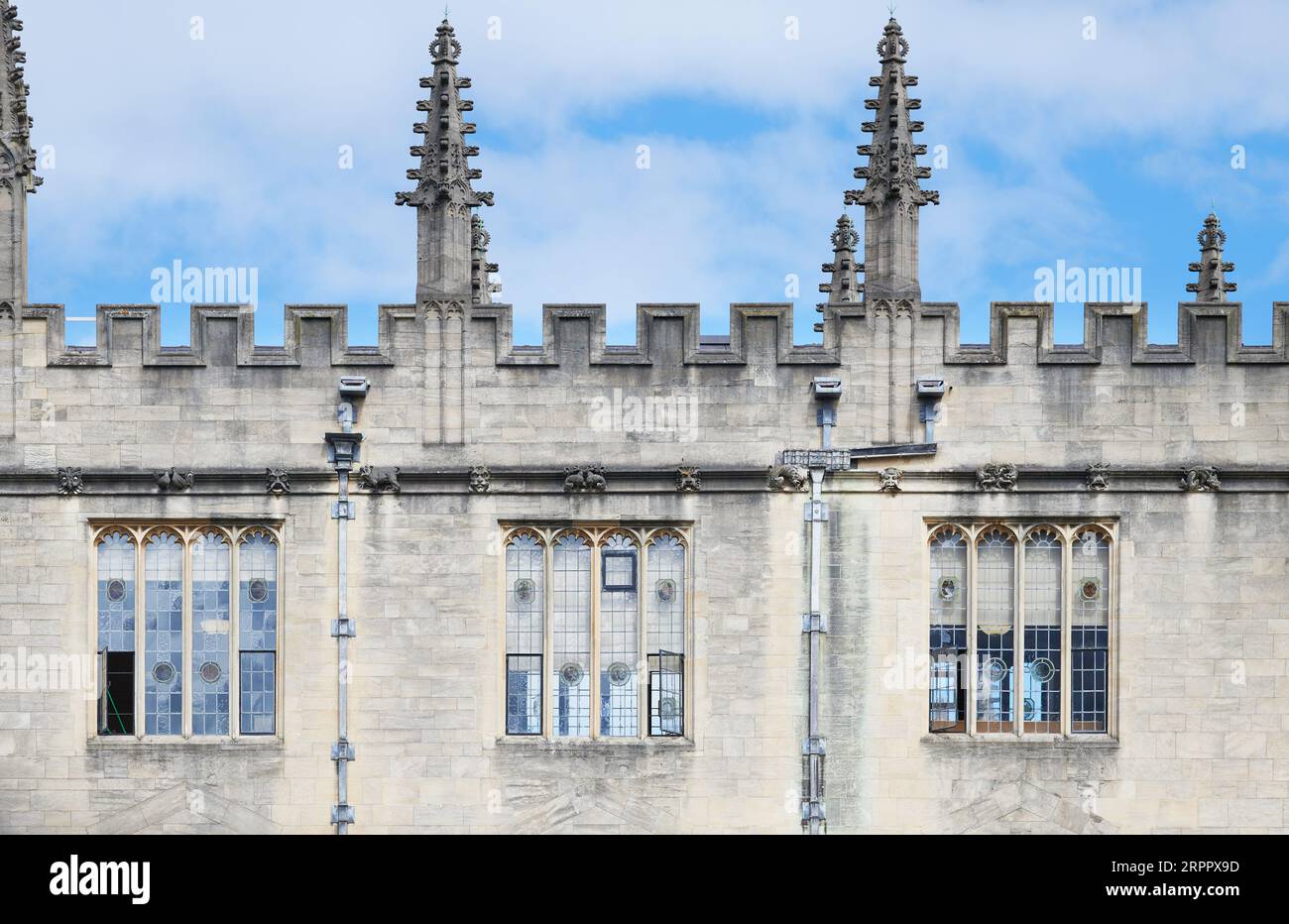 A trio of windows at the BodleianLibrary, University of Oxford, England ...