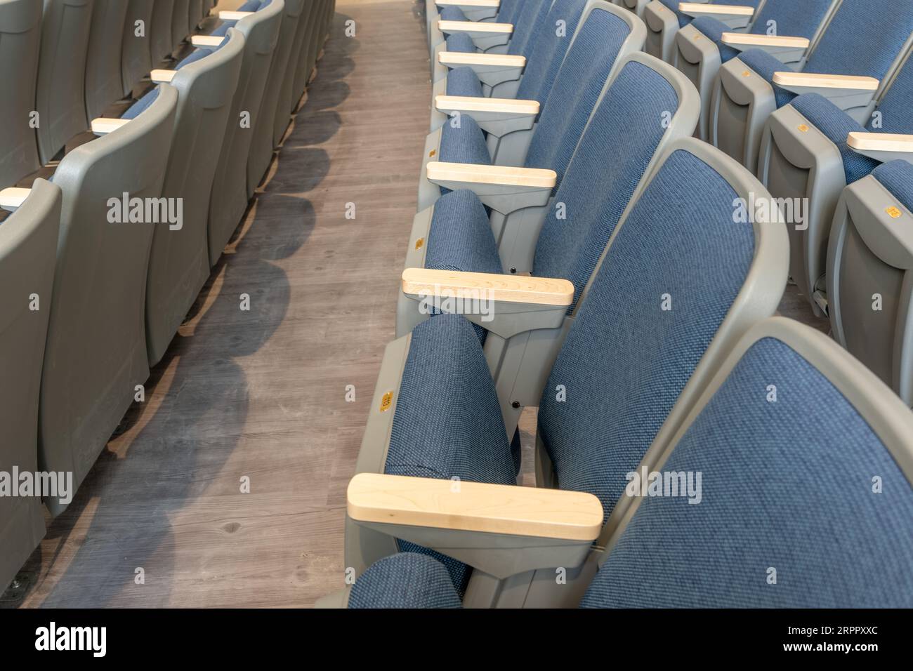 Close up image of empty gray and blue theater, auditorium seats, chairs ...