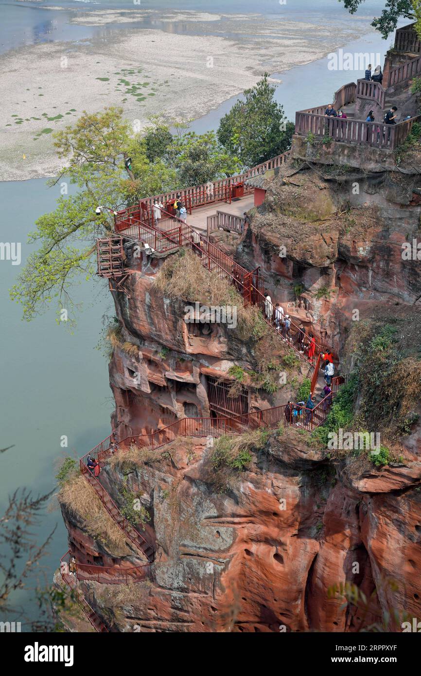 200323 -- LESHAN, March 23, 2020 -- Tourists walk at Leshan Giant ...